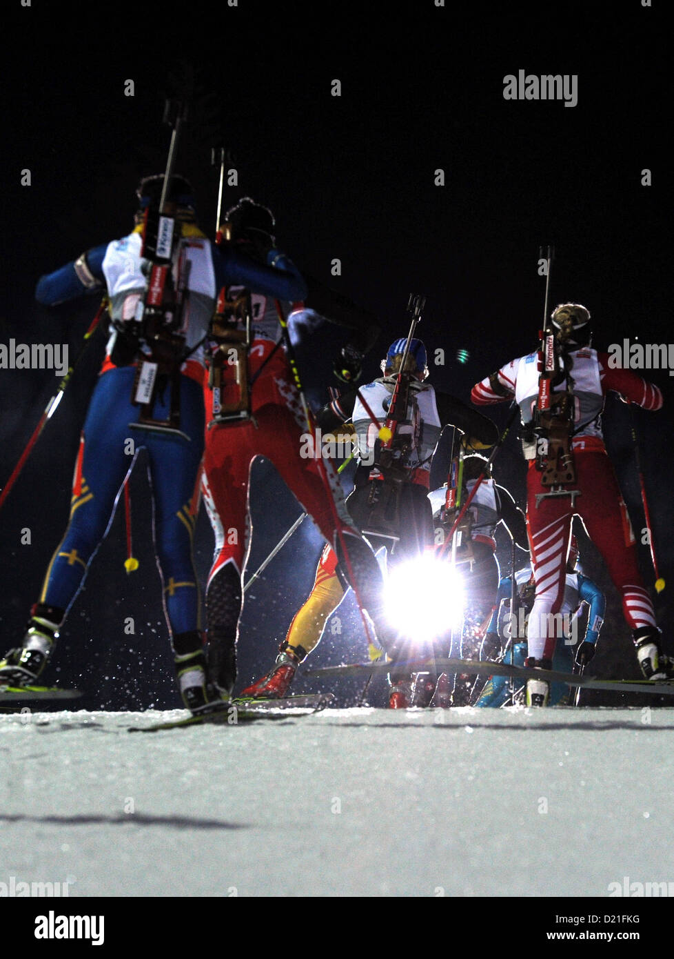 Biathletes in action during the women's relay event at the biathlon ...