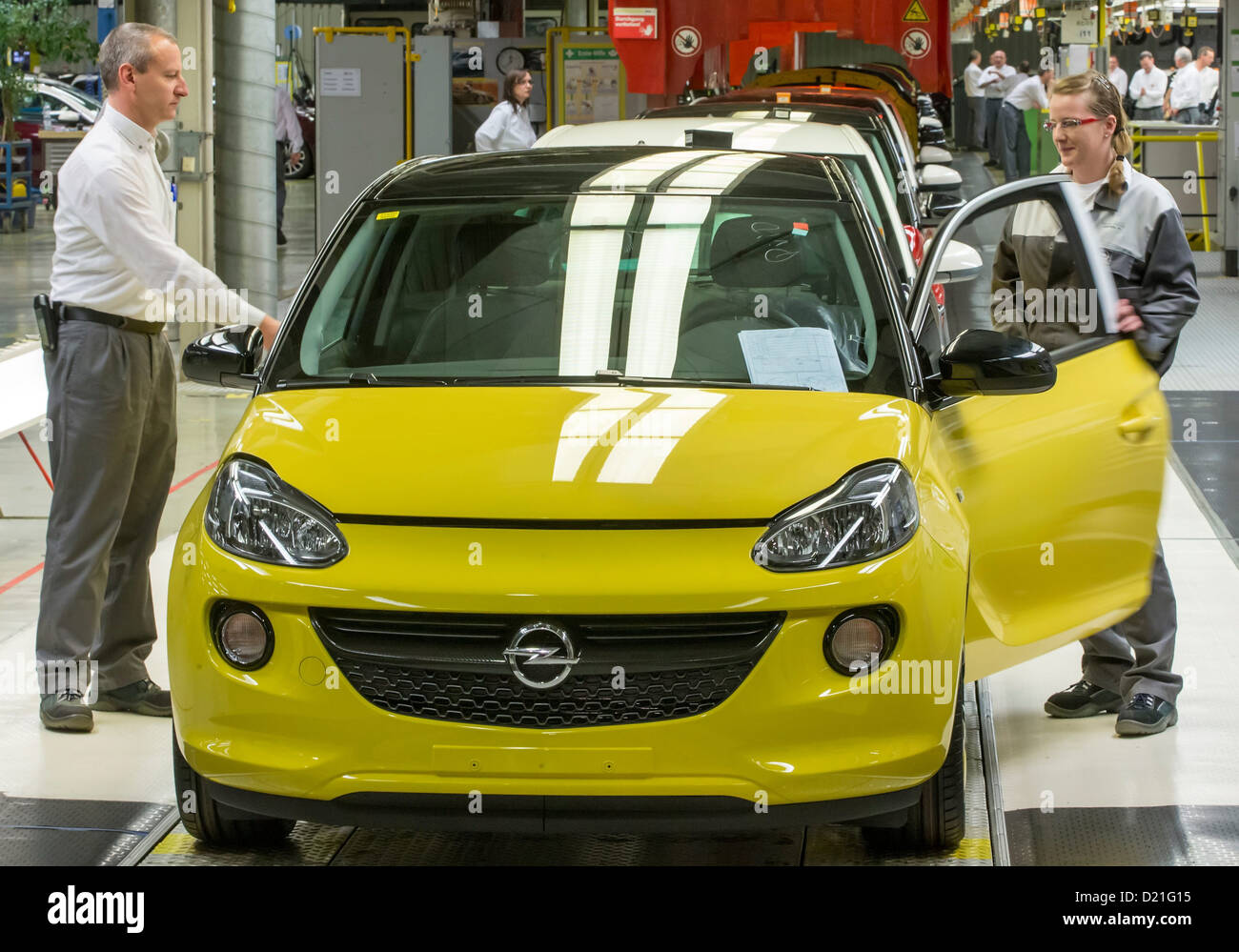 Opel employees work on the new Opel model Adam at the factory in ...