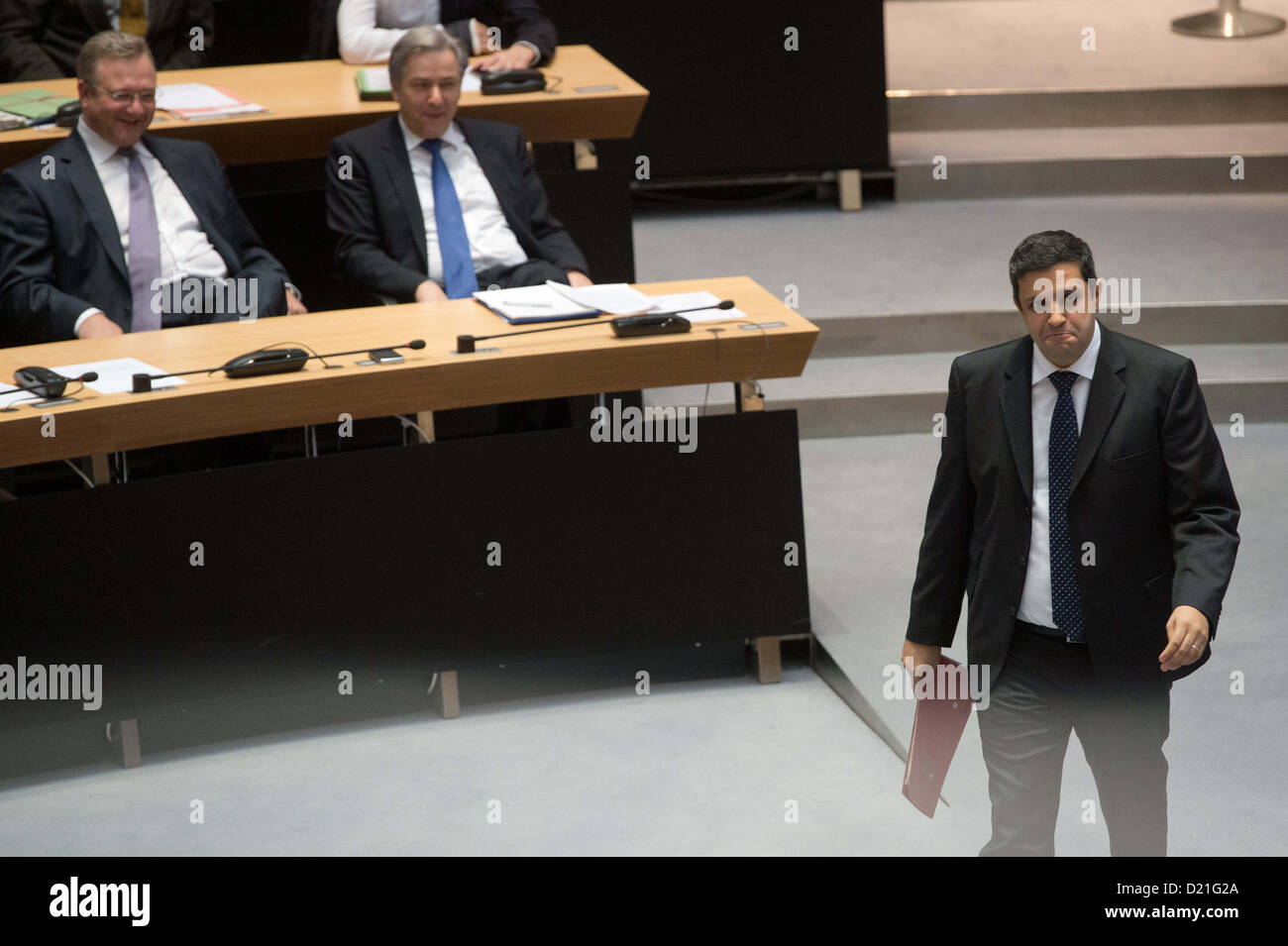 The SPD party leader in Berlin's state legislature Raed Saleh (R) walks ...
