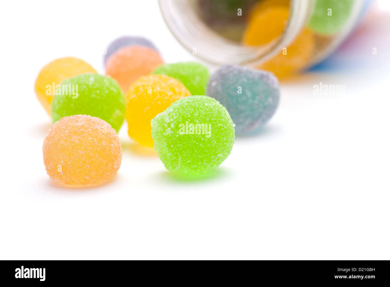 Multi-colored candies isolated on white Stock Photo - Alamy