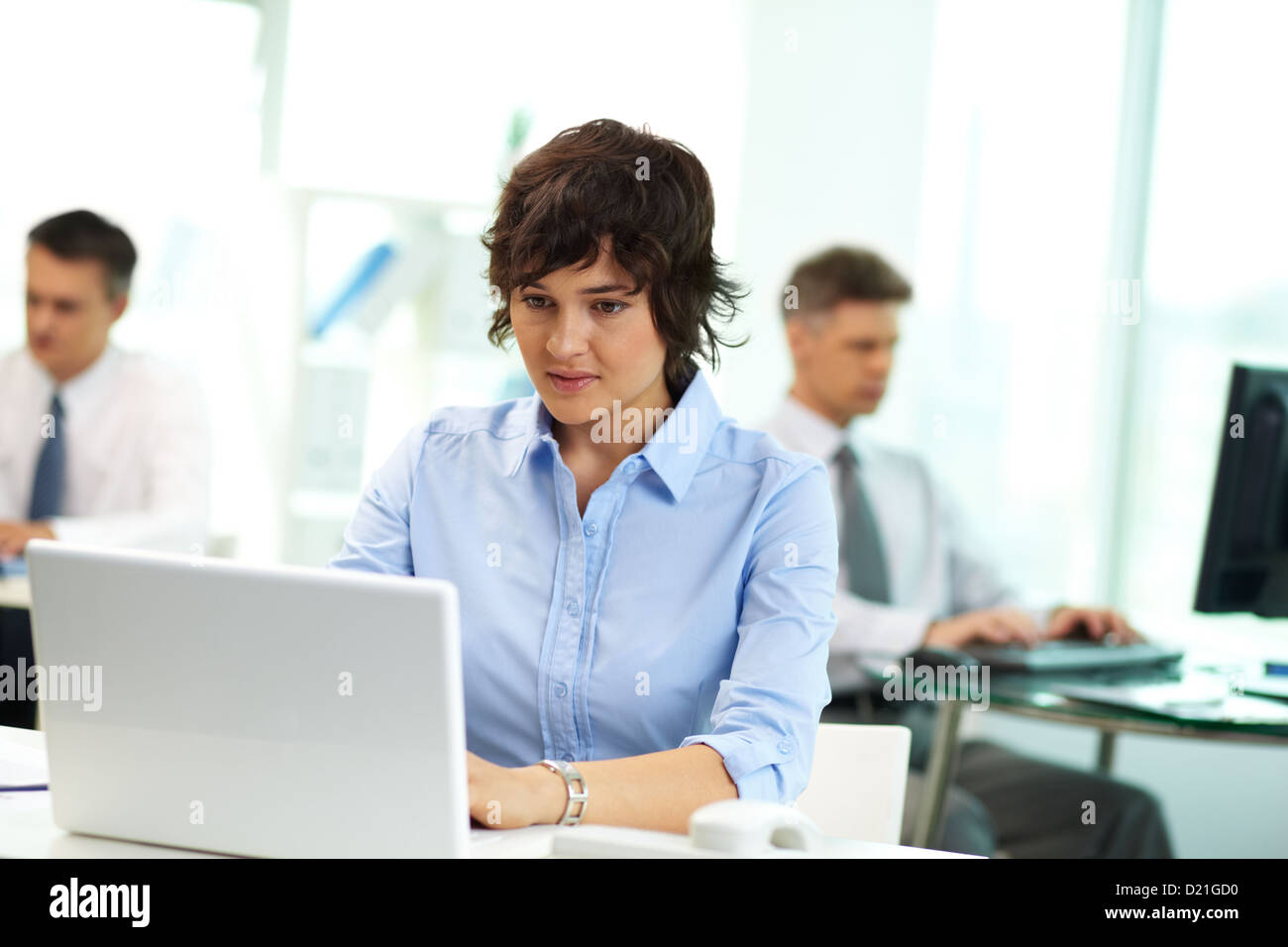 Office people being absorbed in their work Stock Photo - Alamy