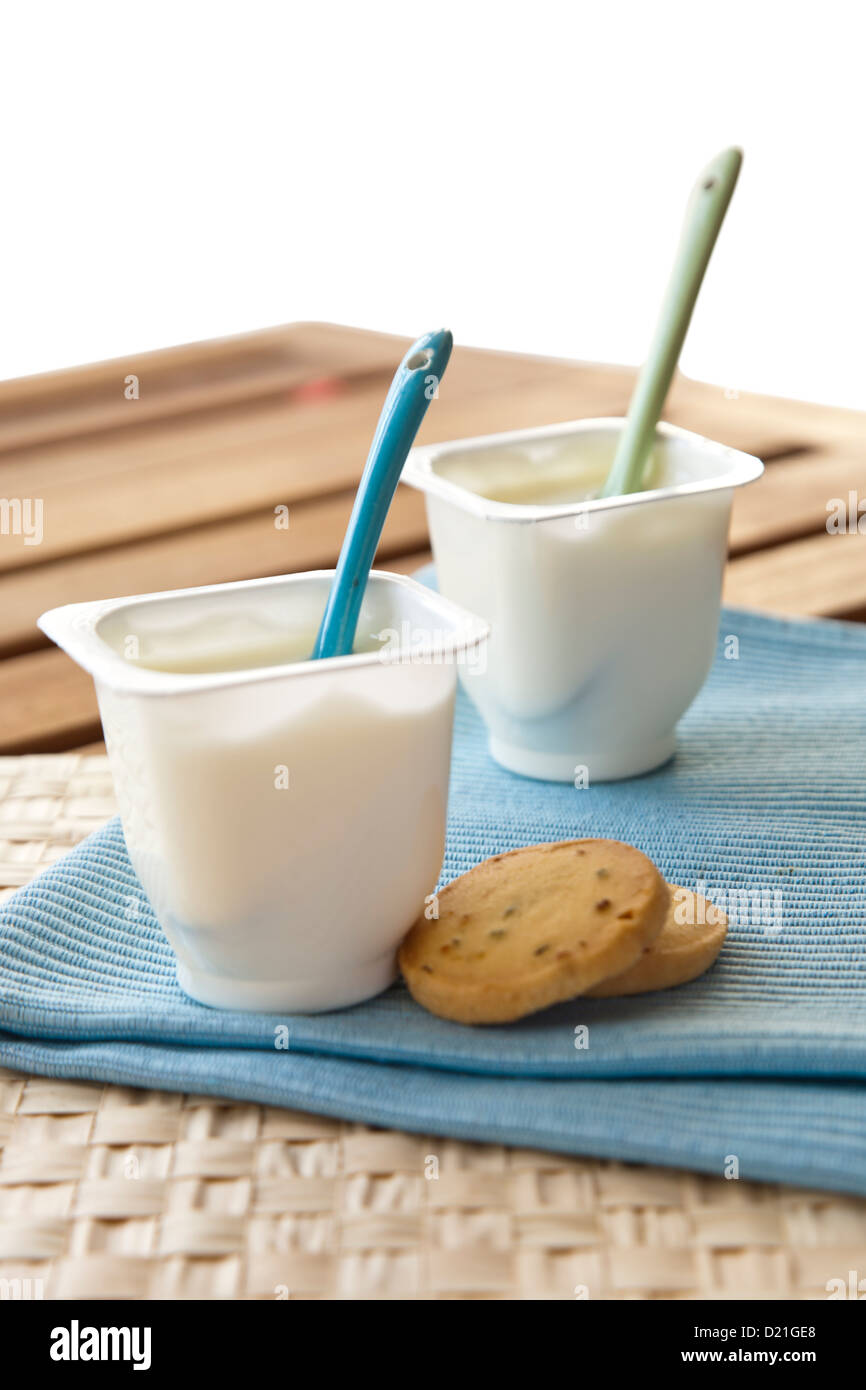 TWO Cup of yogurt with cookies Stock Photo - Alamy