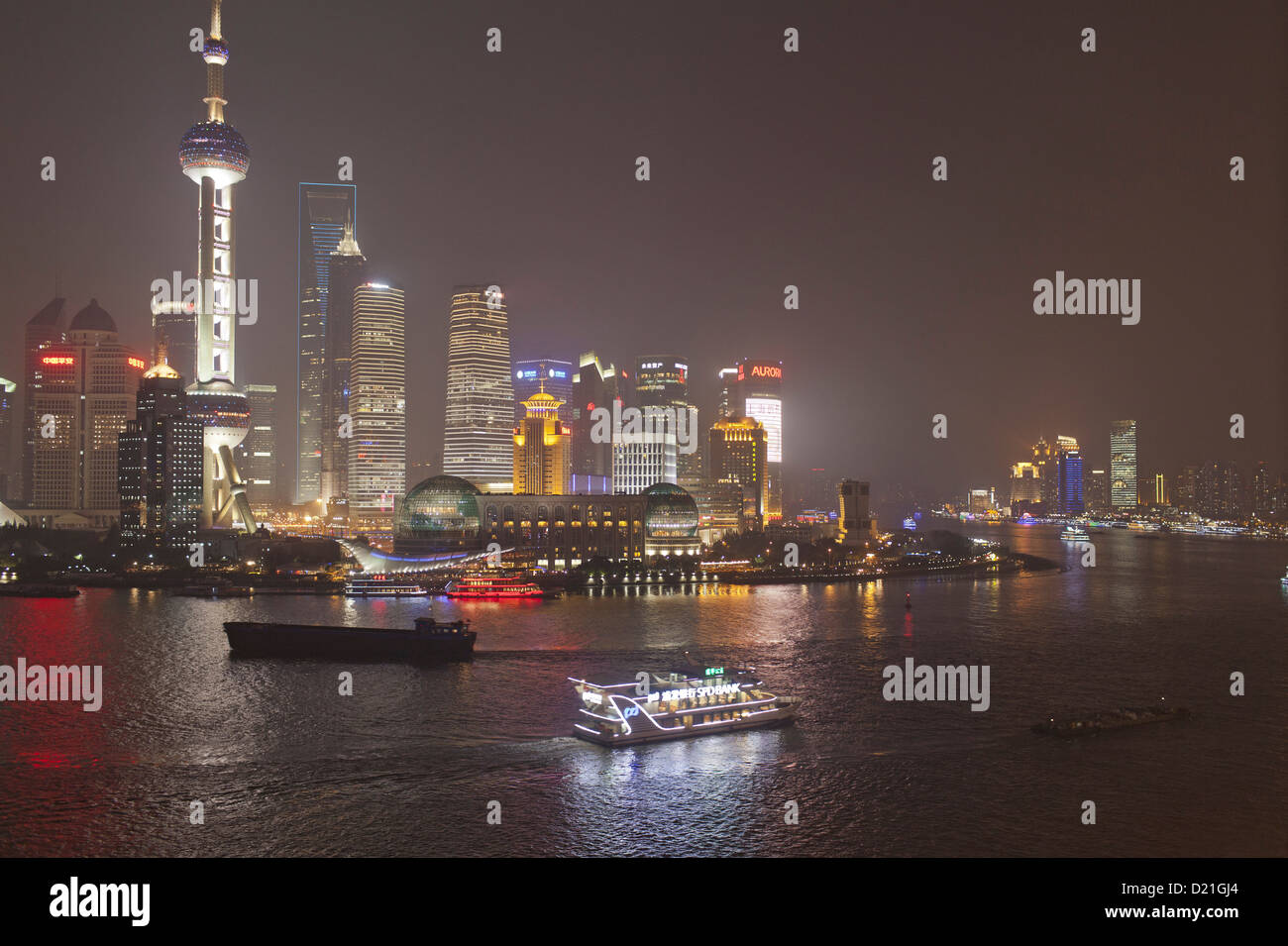 View over Huangpu River onto the skyline of Pudong at night, Shanghai ...