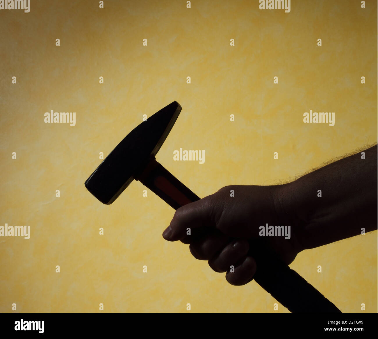 mens hand holding a hammer Stock Photo - Alamy