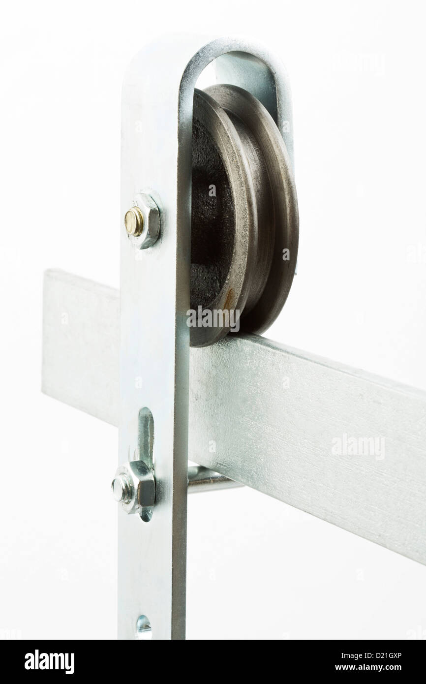 Track Pulley against white background Stock Photo - Alamy
