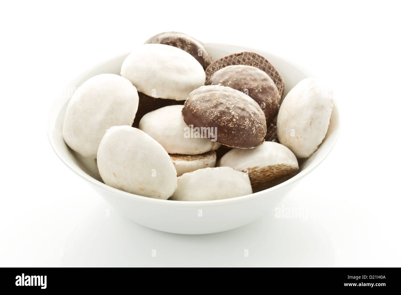 Bowl full of gingerbread on white background, close up Stock Photo - Alamy
