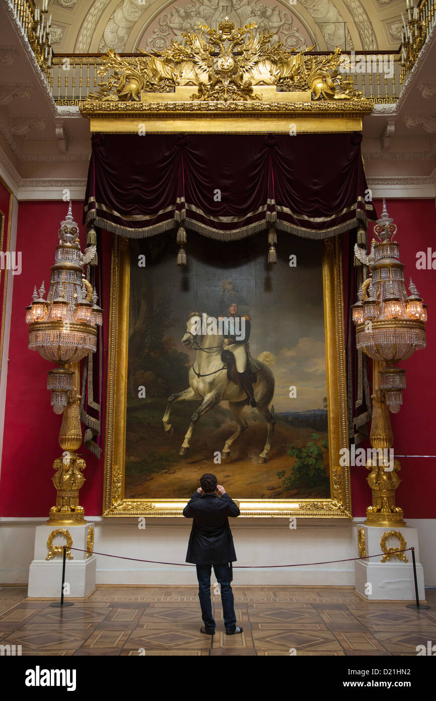 Man photographing painting inside The Hermitage museum complex, St ...