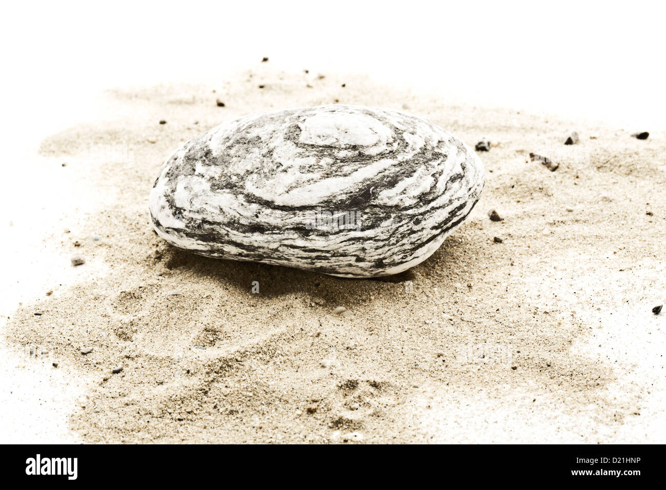 Marble stones on sand, close up Stock Photo - Alamy