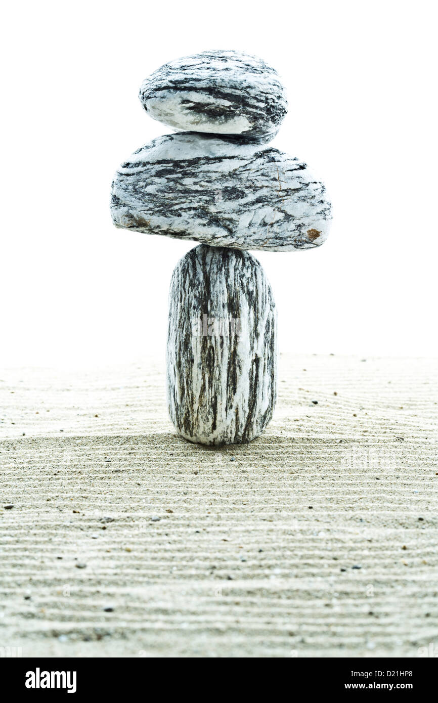 Marble stones on sand, close up Stock Photo - Alamy