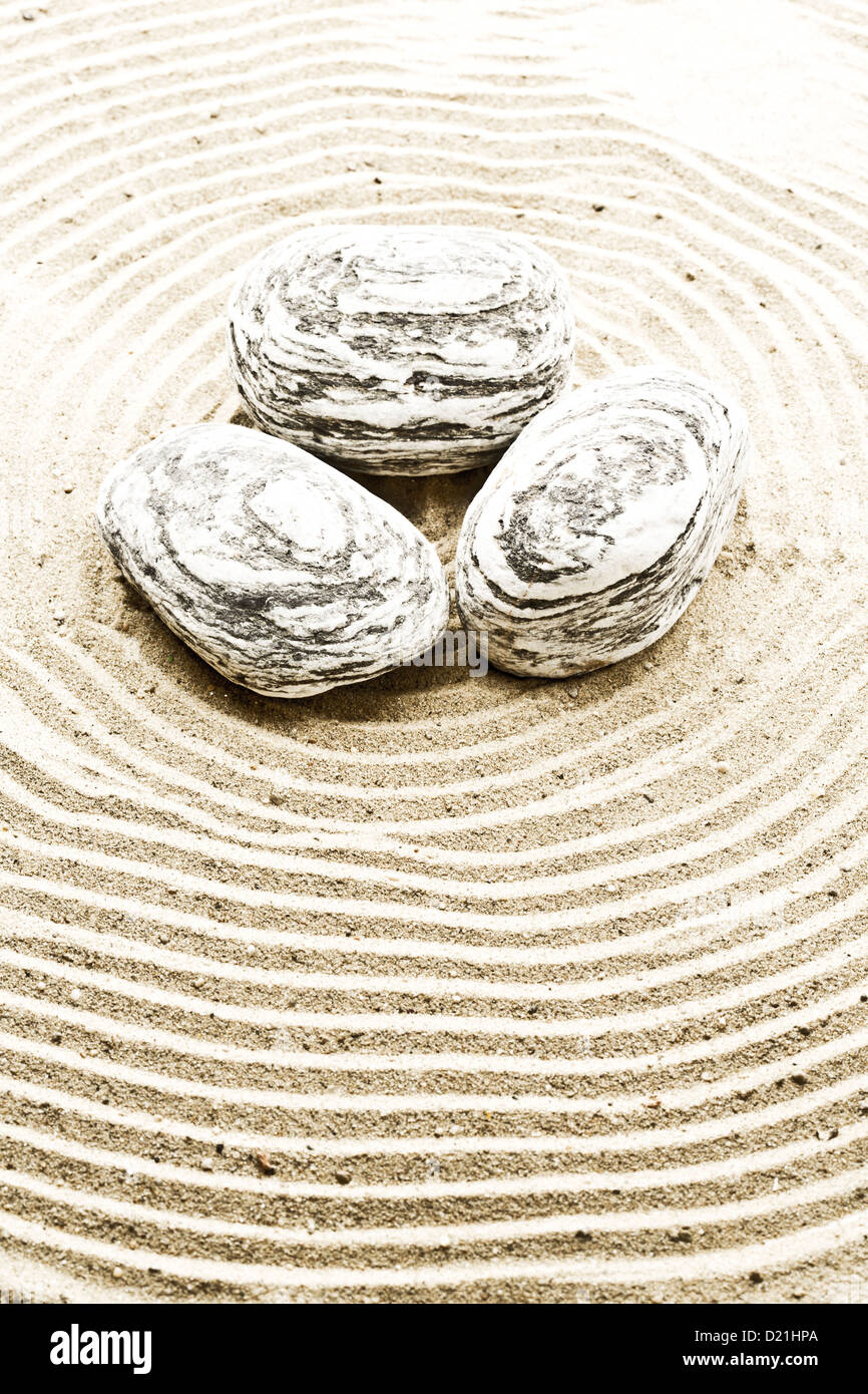Marble stones on sand, close up Stock Photo - Alamy