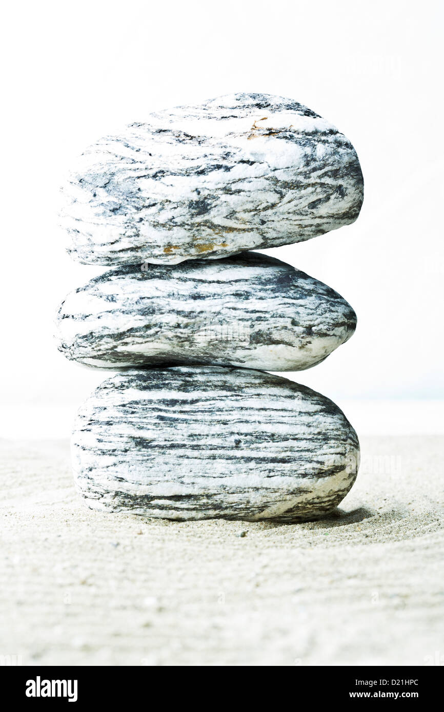 Marble stones on sand, close up Stock Photo - Alamy