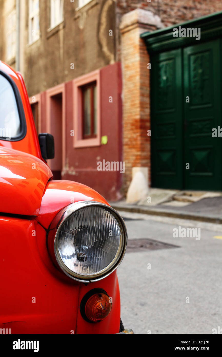 Old orange Fiat 500 parked on a street Stock Photo - Alamy