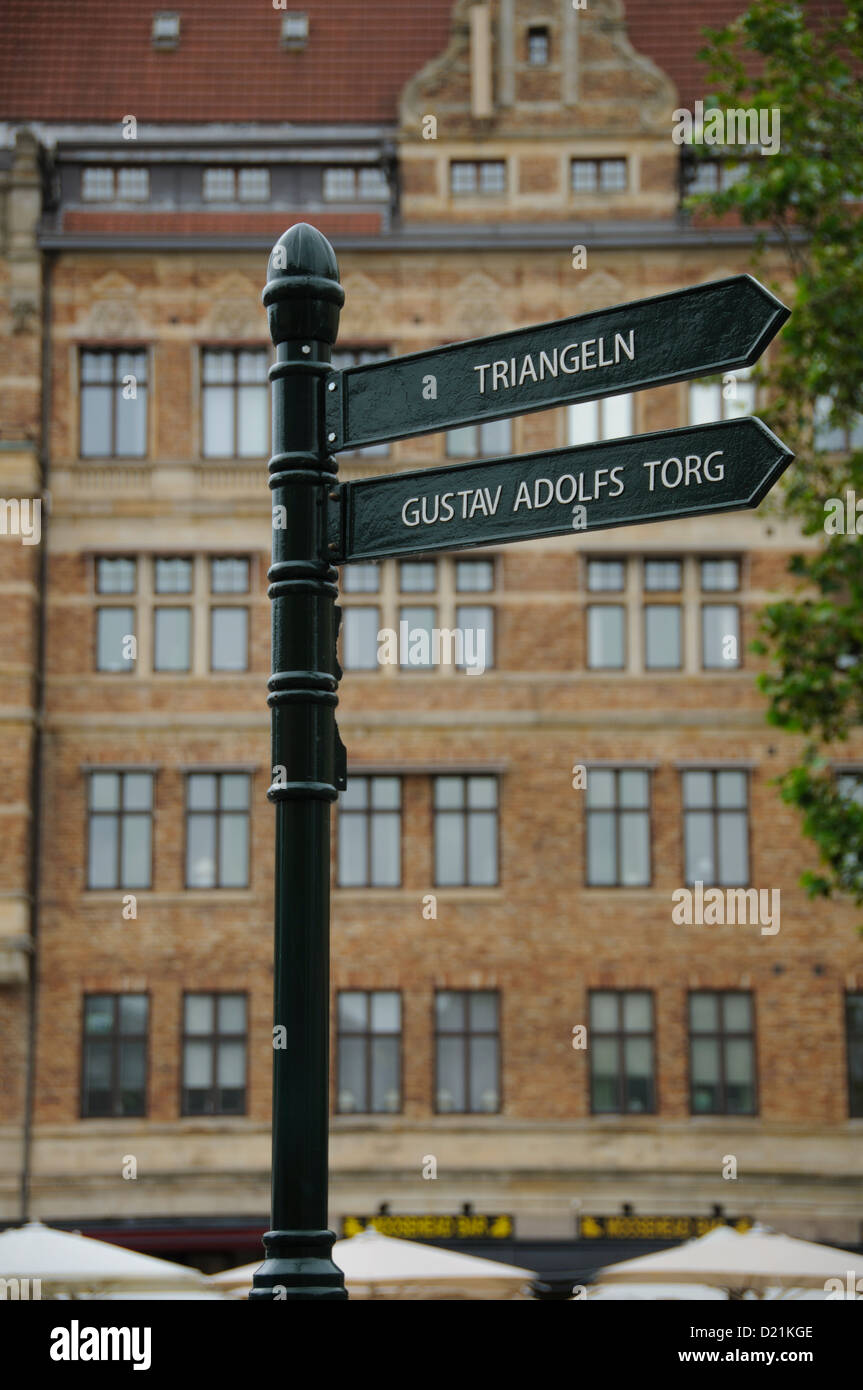 Iron signpost in Malmo, Sweden, giving directions for two of the ...