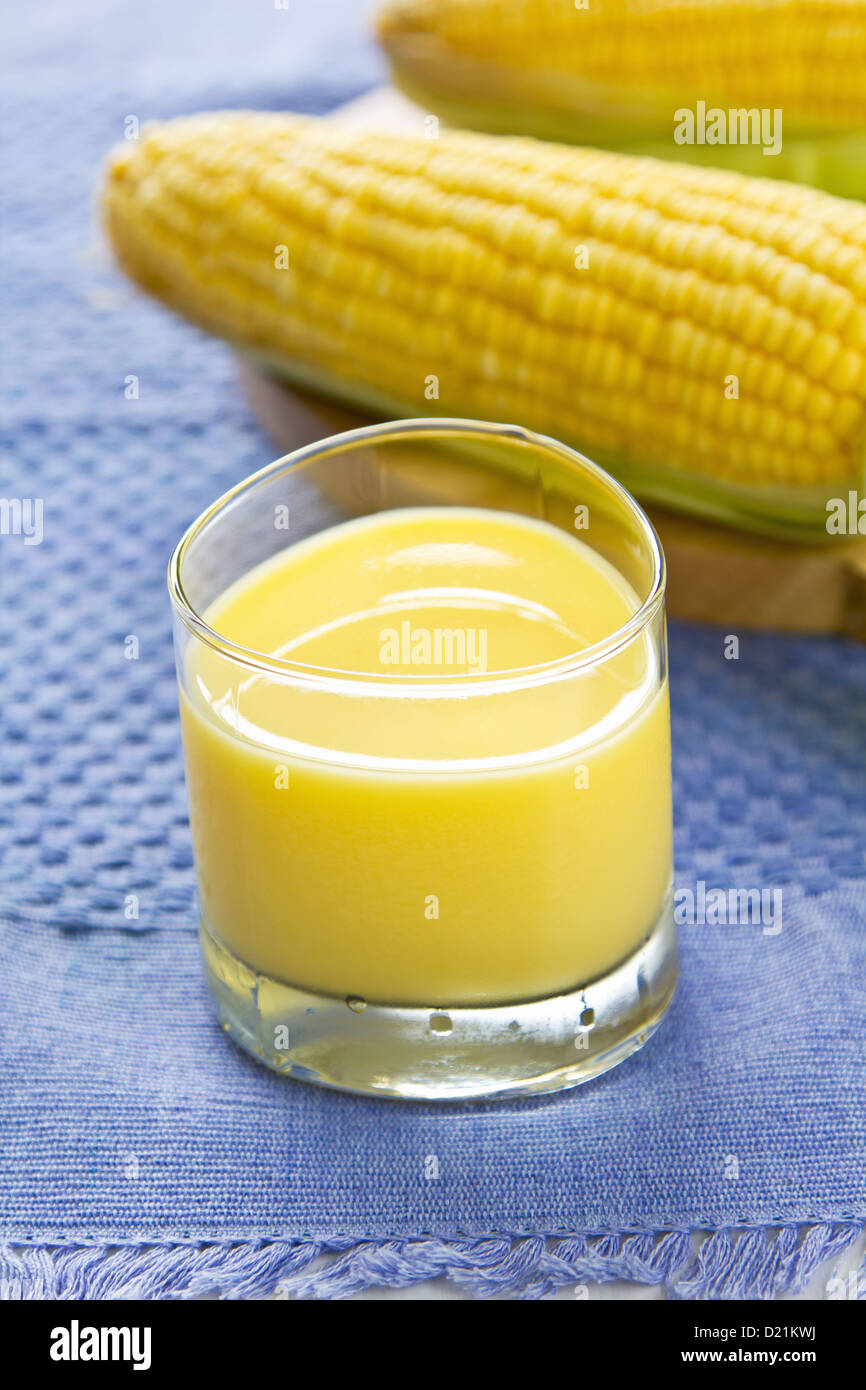 Fresh sweet corn juice by raw corns Stock Photo - Alamy
