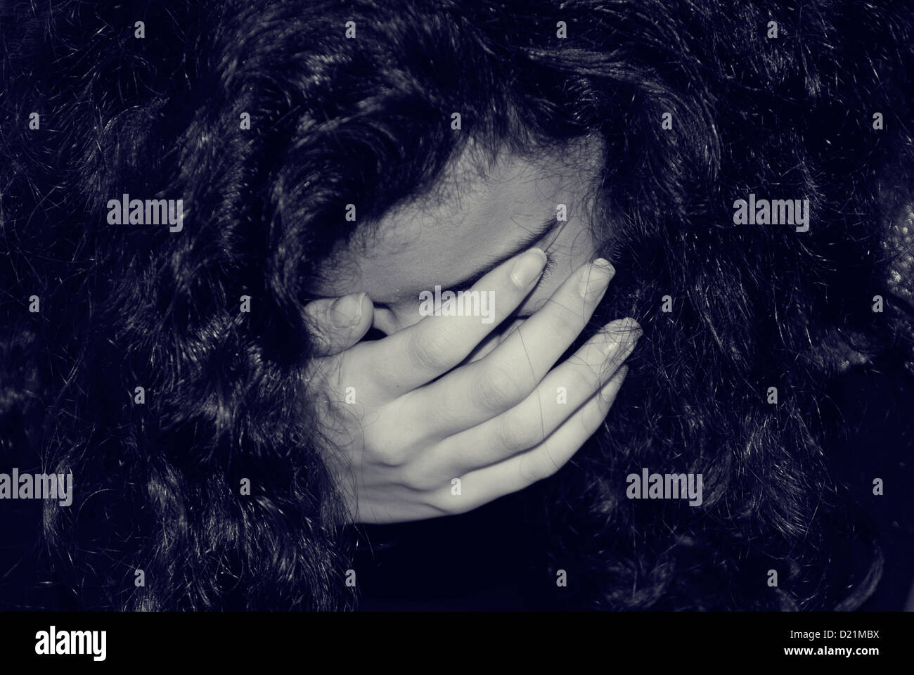 young teenage girl crying head in hands Stock Photo - Alamy
