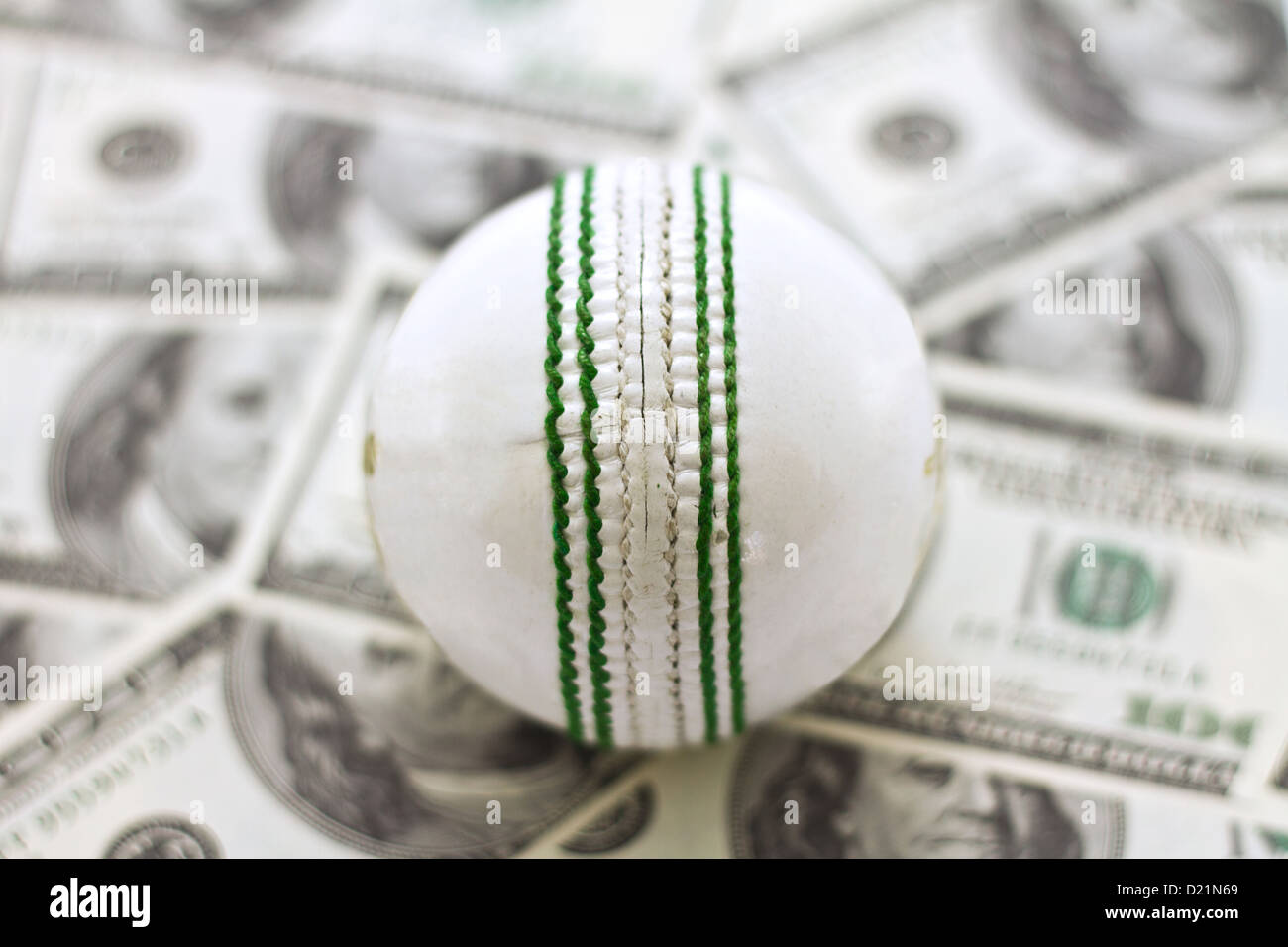 Cricket Ball on Money Stock Photo - Alamy