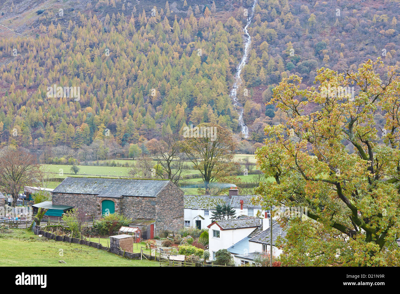 Houses in front of a waterfall in Buttermere, Lake District Stock Photo ...