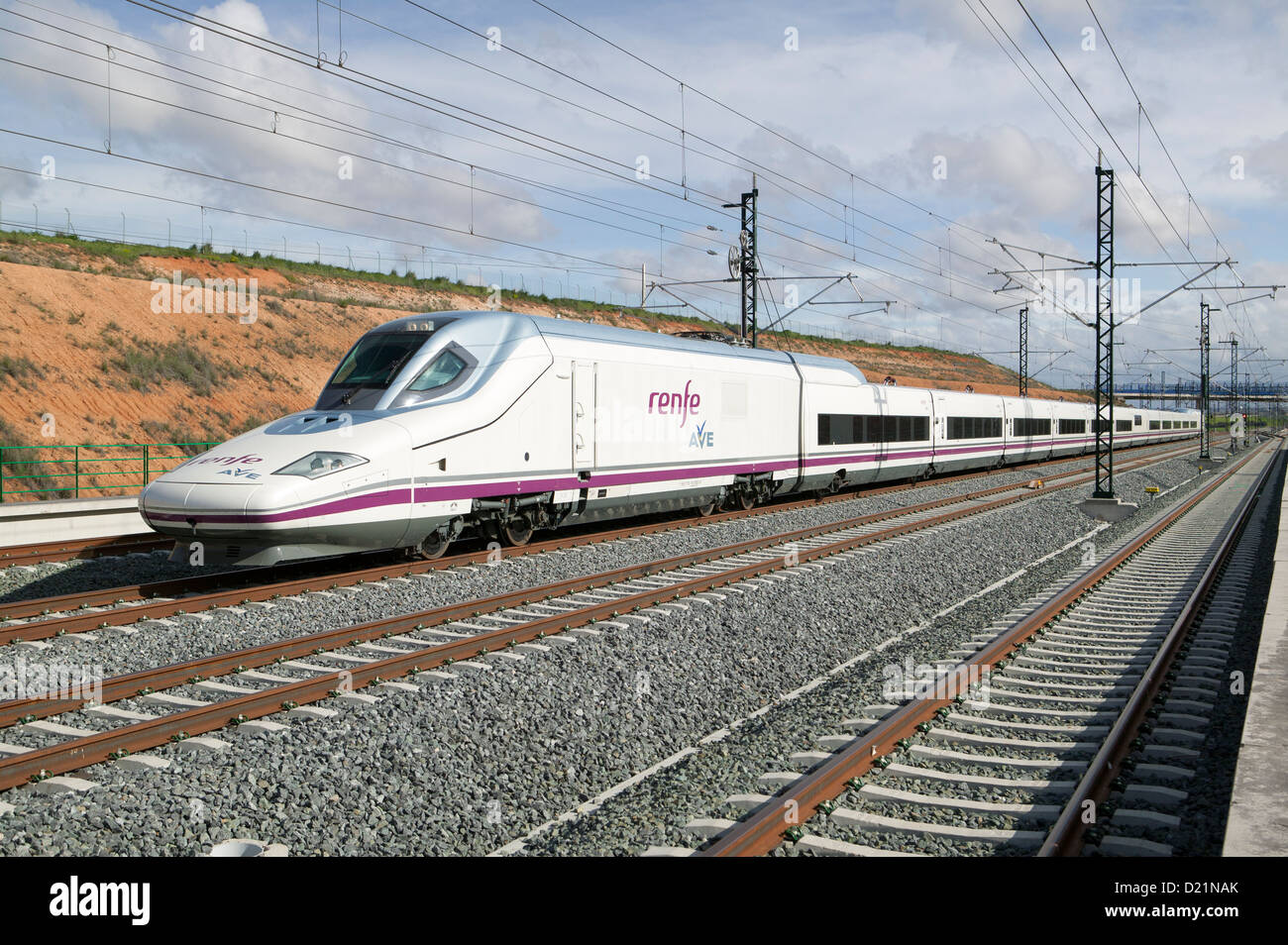 Spanish railway circling the road Stock Photo - Alamy