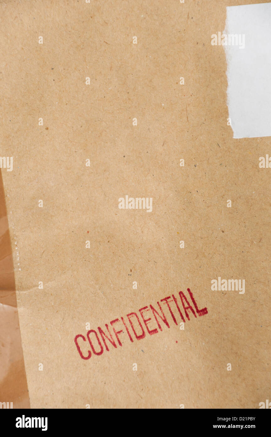 Confidential stamped on brown envelope Stock Photo - Alamy