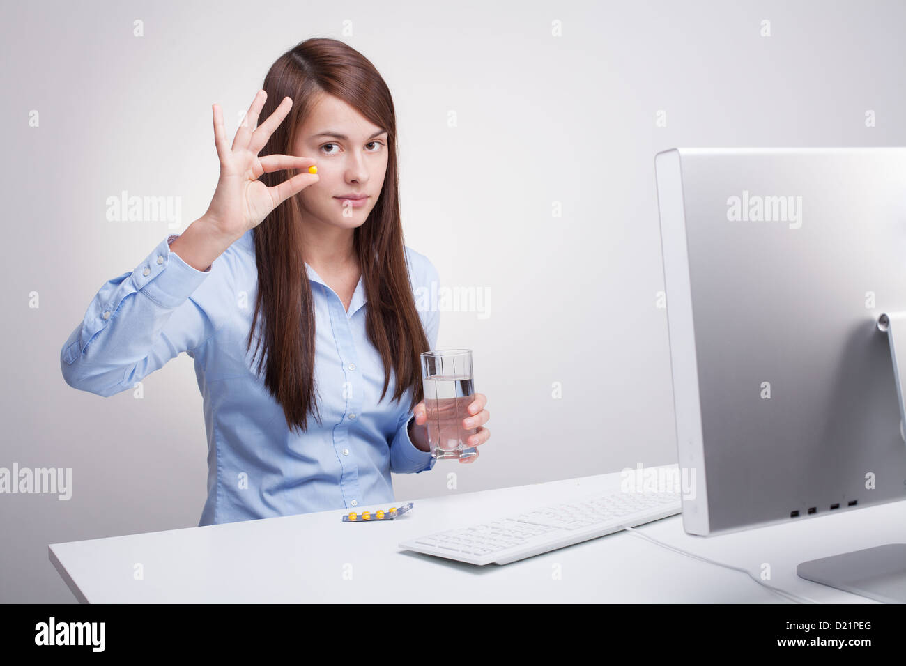 headache at work Stock Photo - Alamy