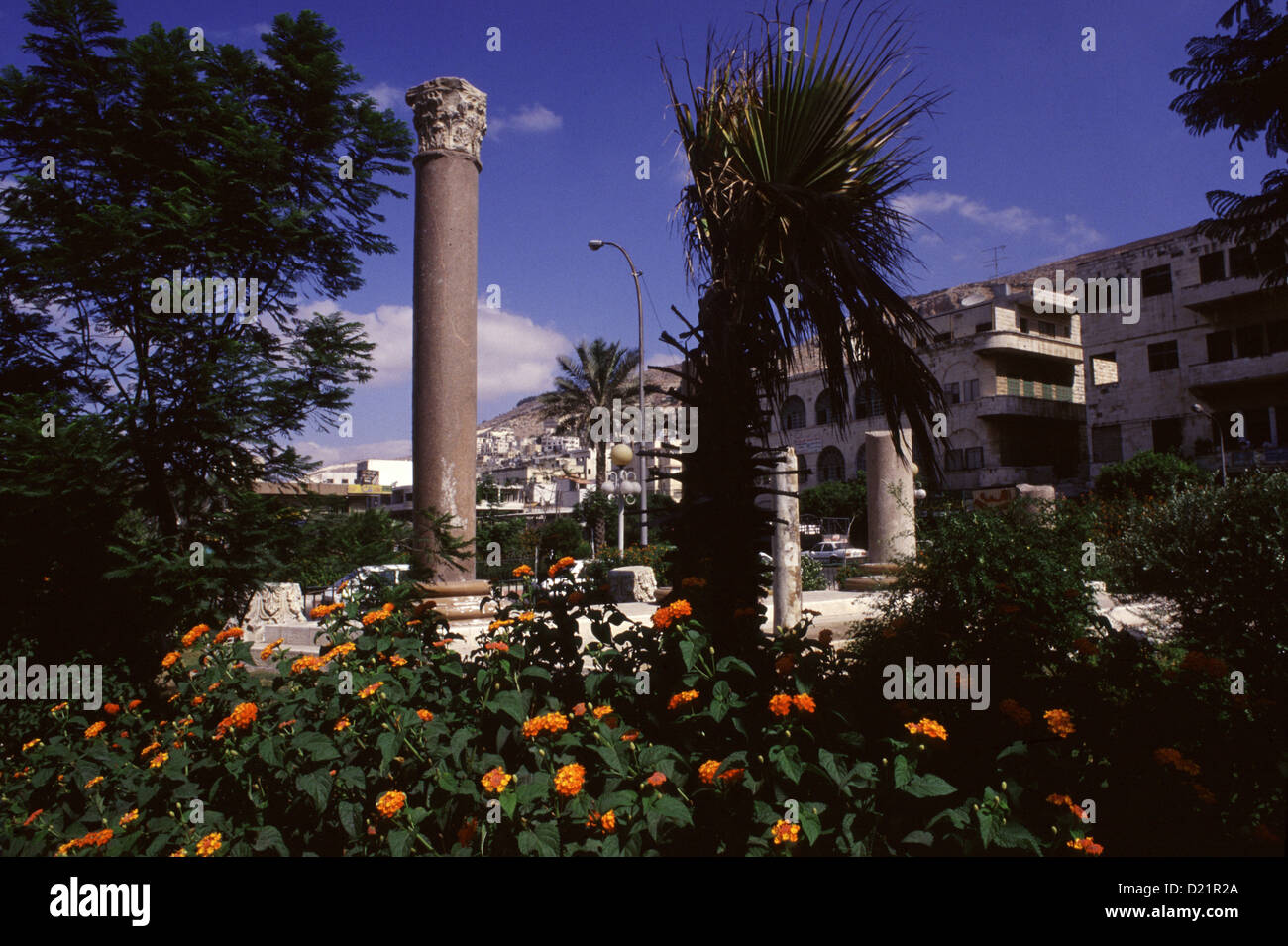 Roman ruins placed at a roundabout in the center of the Palestinian ...