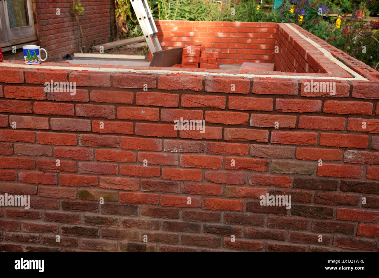 Constructing a conservatory - dwarf walls complete - brigs placed frog ...