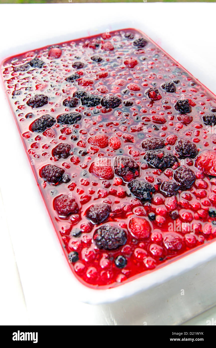 Cheesecake with berries on top Stock Photo - Alamy