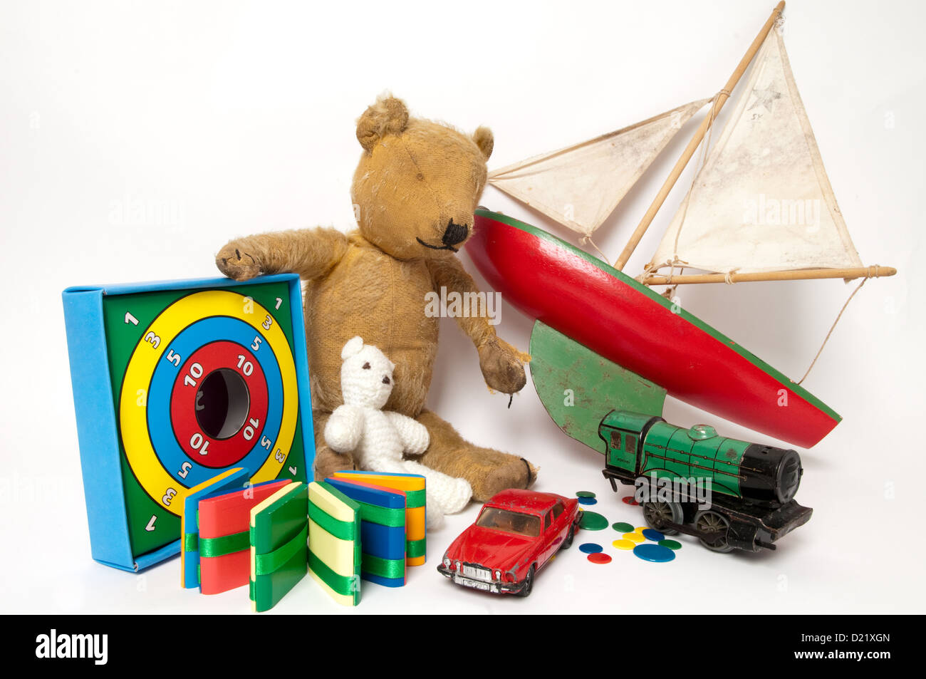 A collection of well-loved classic simple children's toys including a ...
