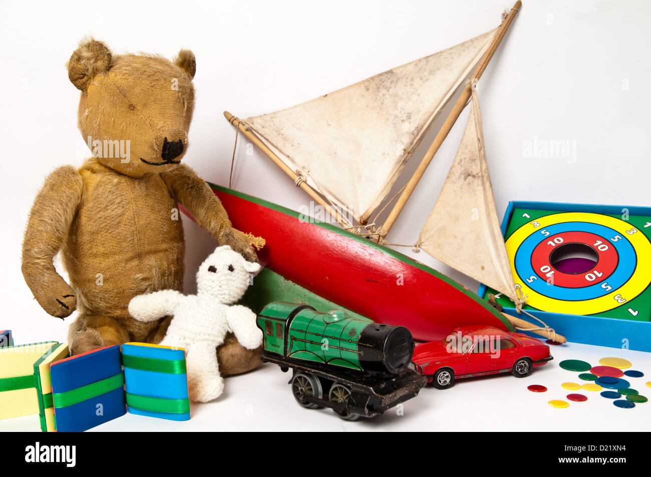 A collection of well-loved classic simple children's toys including a ...