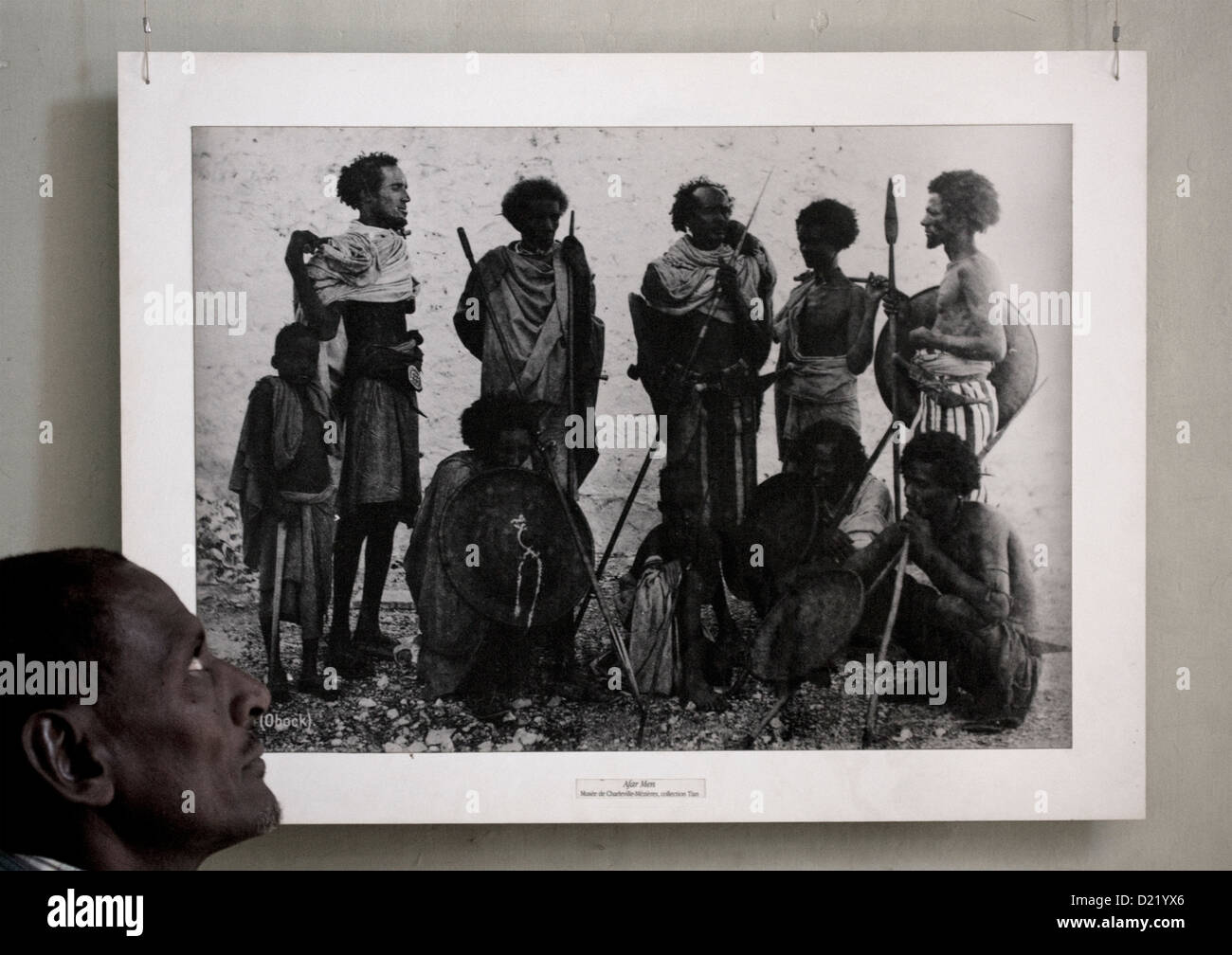 Afar Man Watching An Old Picture Of His Ancestors, Harar, Ethiopia ...