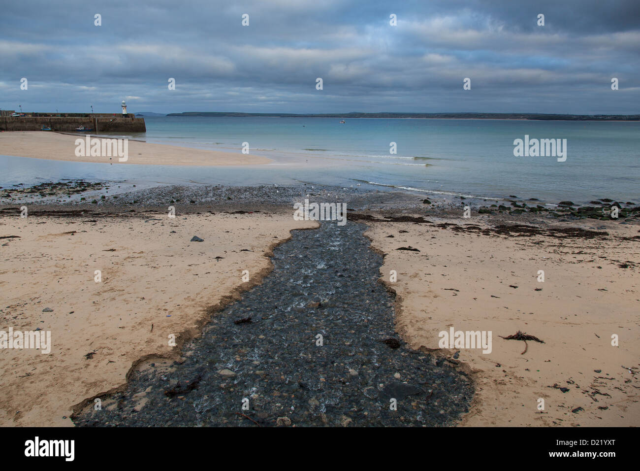 Water outfall into the harbour at St Ives Stock Photo - Alamy