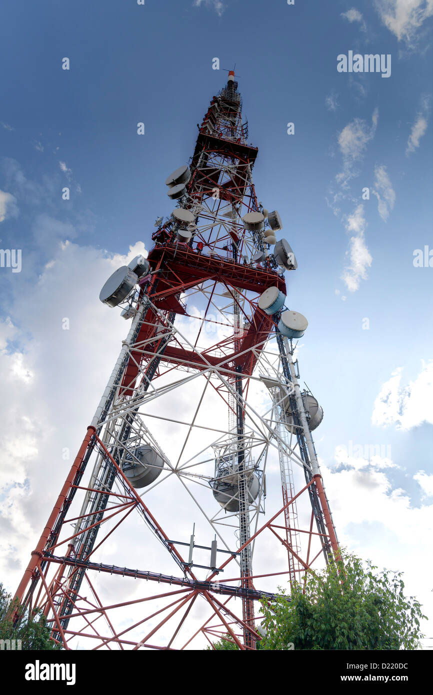 Telecommunications satellite dish and communications towers Stock Photo - Alamy
