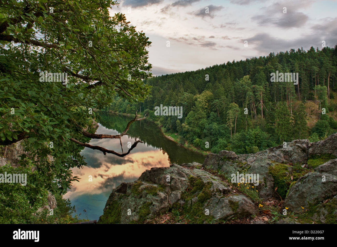 Beautiful dramatic sunset over the river canyon from the cliff above ...