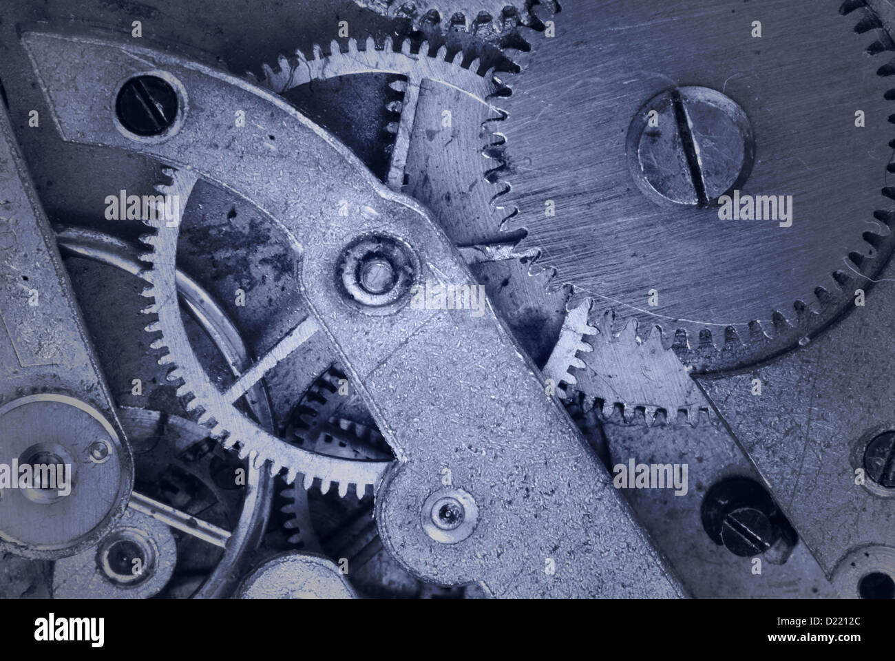 Mechanism of old clock - sprockets in the system are well visible, blue ...