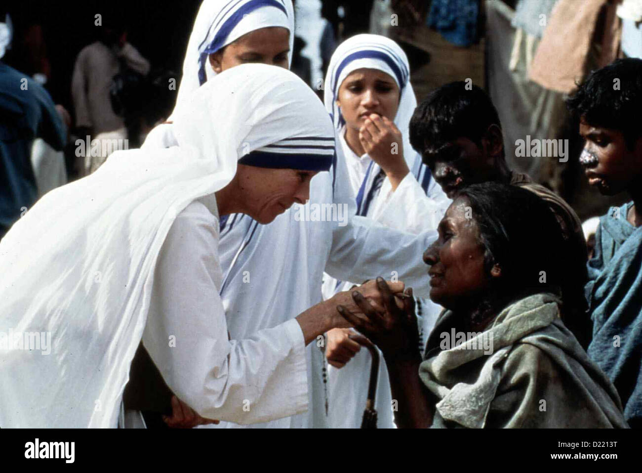 Mother Teresa Helping The Poor