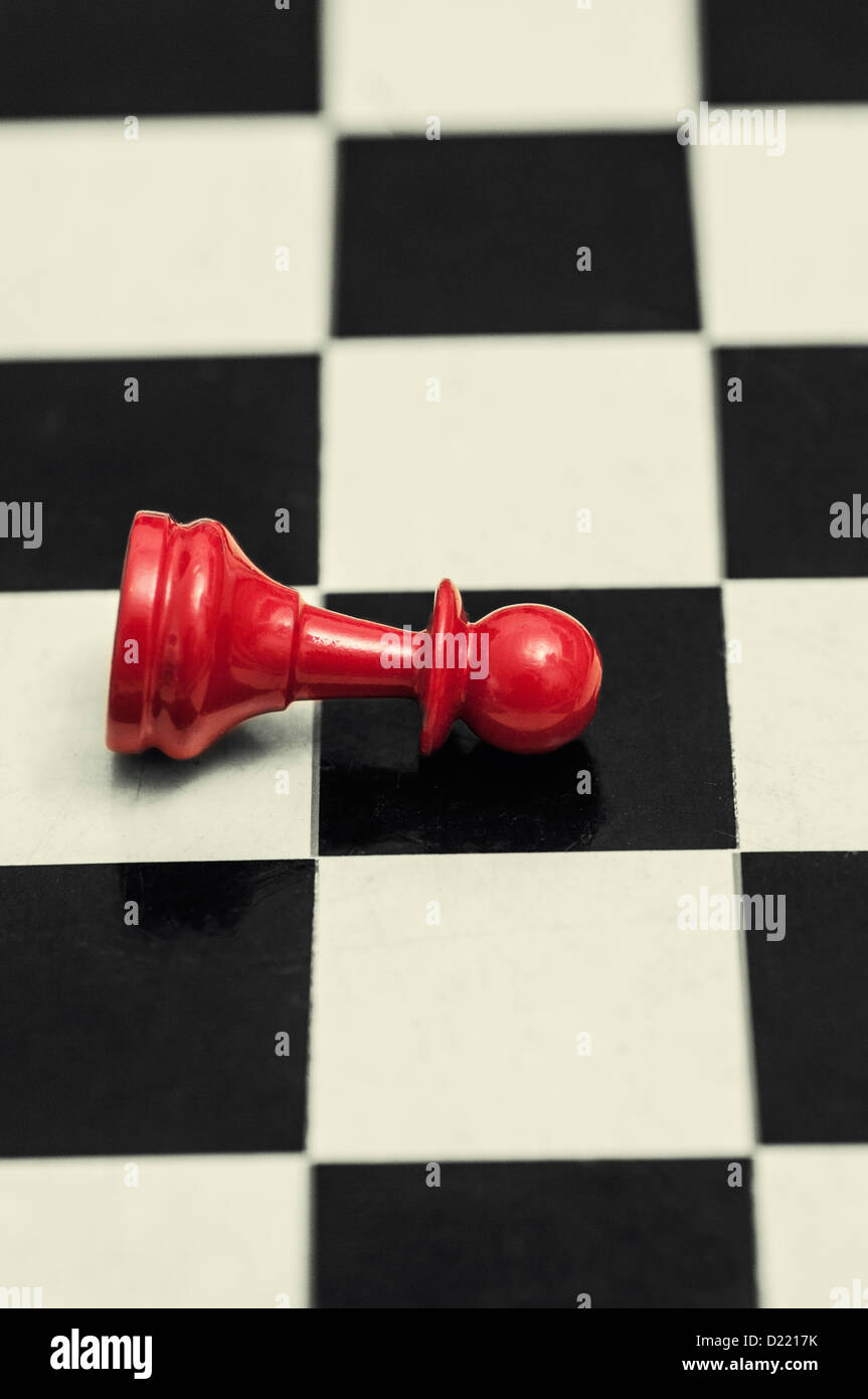 Red pawn on a chess board Stock Photo - Alamy