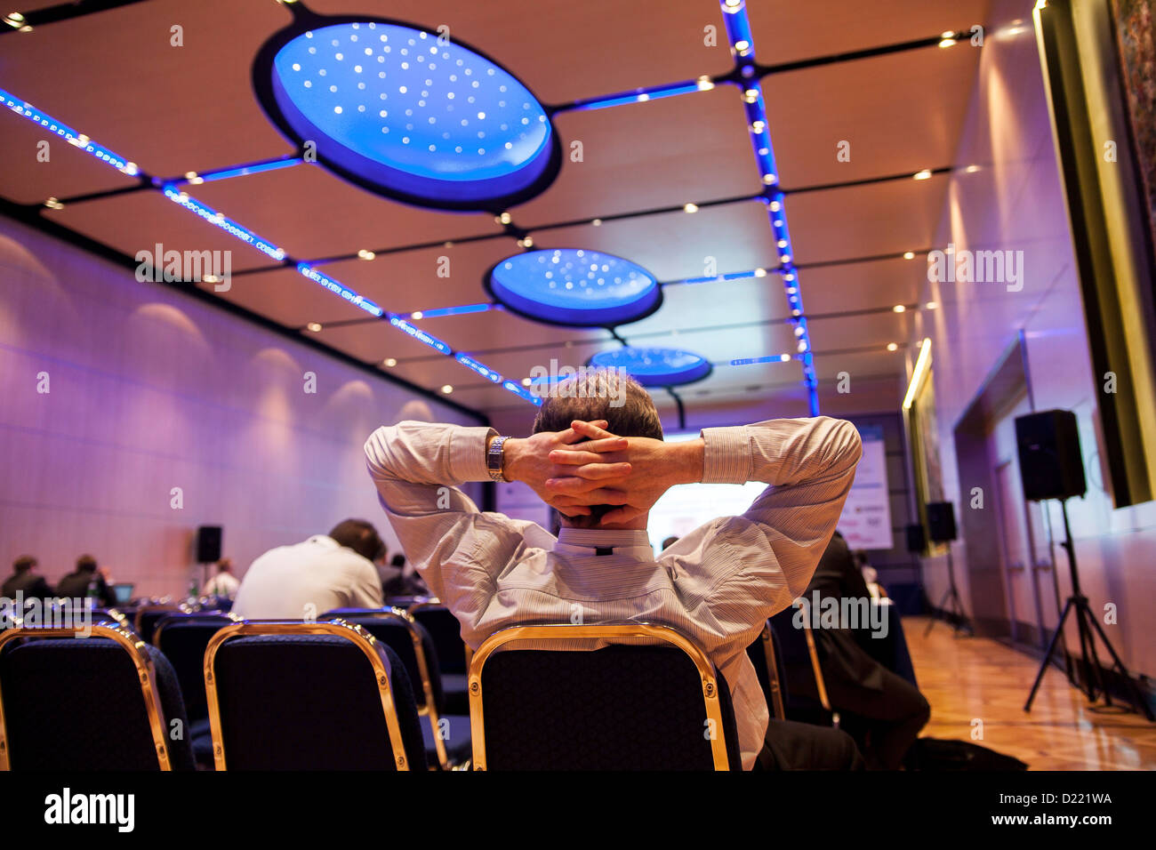 Business man during a conference presentation Stock Photo - Alamy