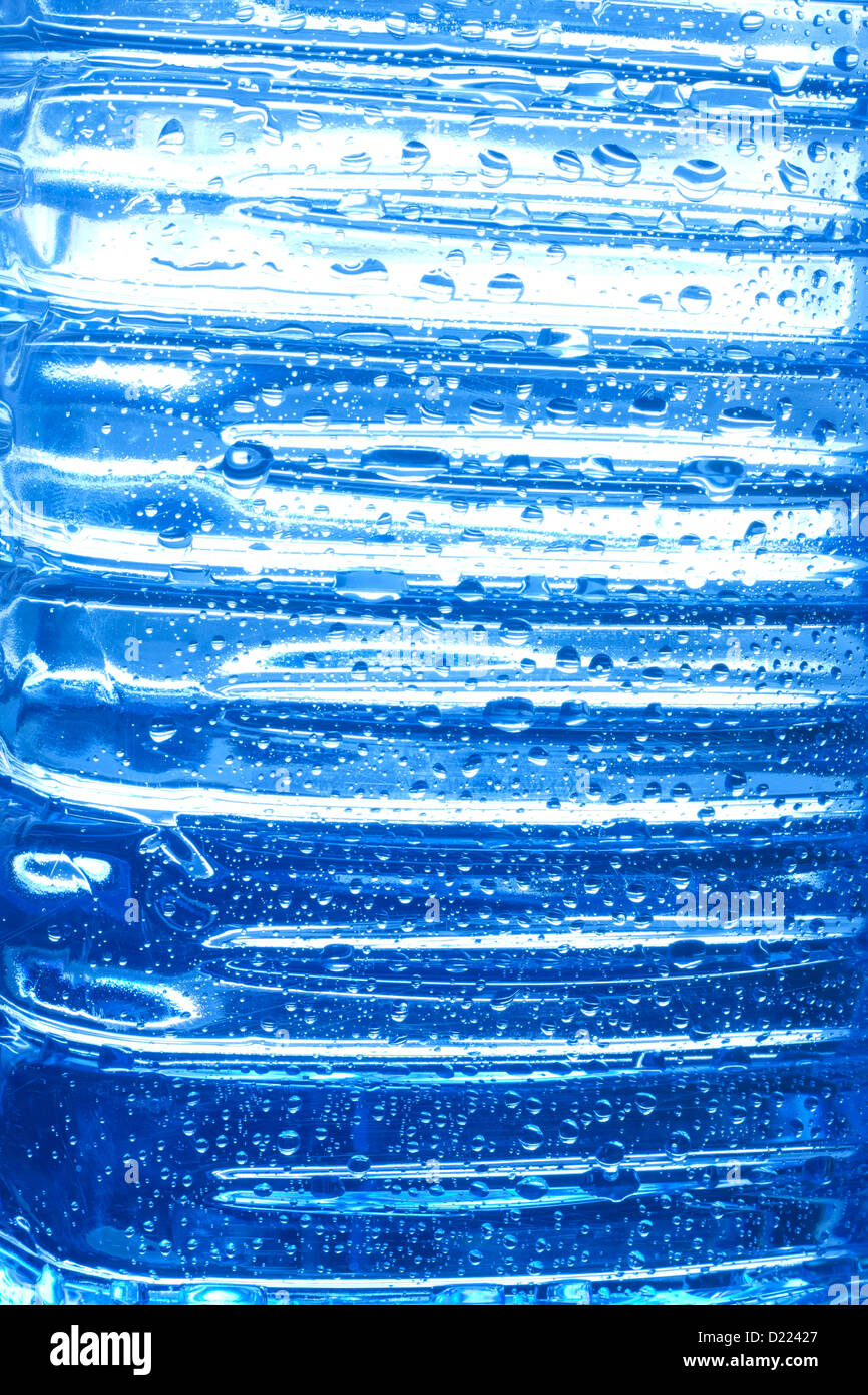 Blue water drops on bottle abstract background texture Stock Photo - Alamy