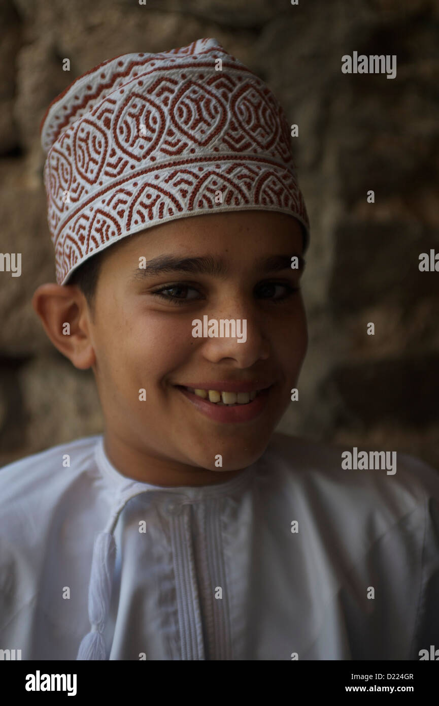 oman boy playing music Stock Photo - Alamy
