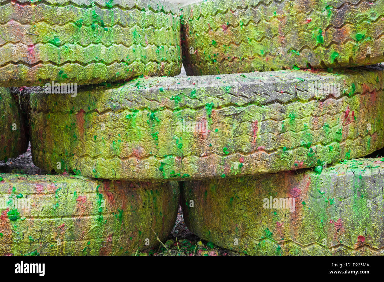 Paint covered barricade made of tires on paintball field, Oregon Stock ...