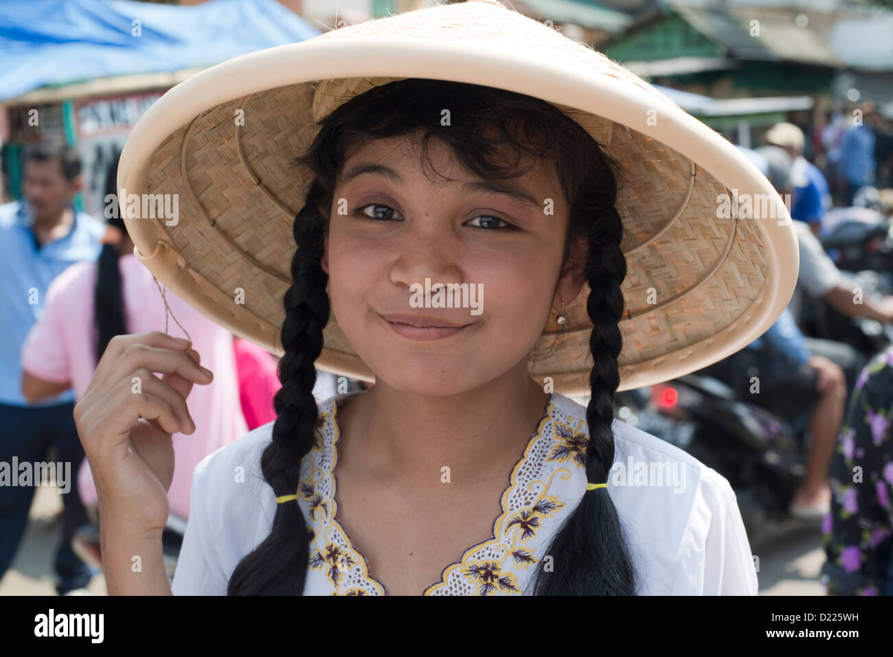 Portrait woman wearing conical hat hi-res stock photography and images - Alamy