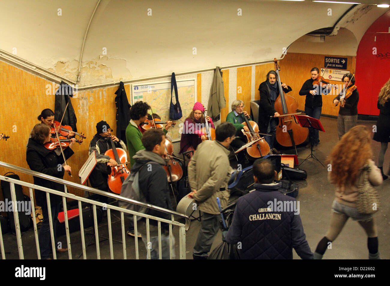 The orchestra plays on the metro station in Paris on November 06, 2012 ...