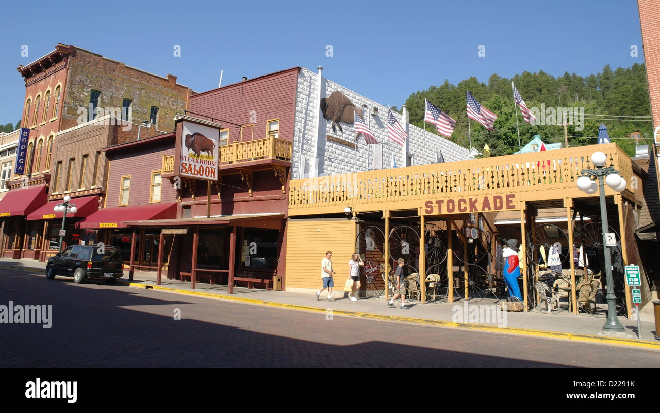 Blue sky view sidewalk people, 'Wild West' Stockade Bar, Buffalo Saloon ...