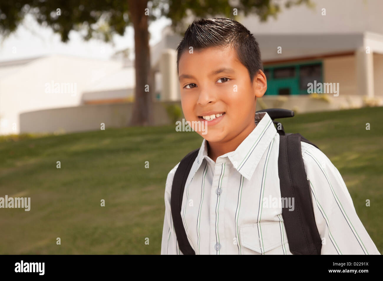 Happy Young Hispanic Boy with Backpack Ready for School Stock Photo - Alamy