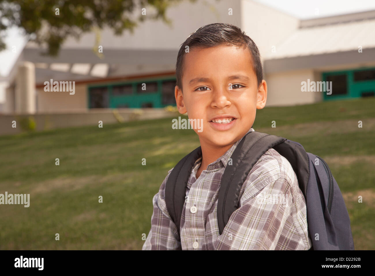 Happy Young Hispanic Boy with Backpack Ready for School Stock Photo - Alamy