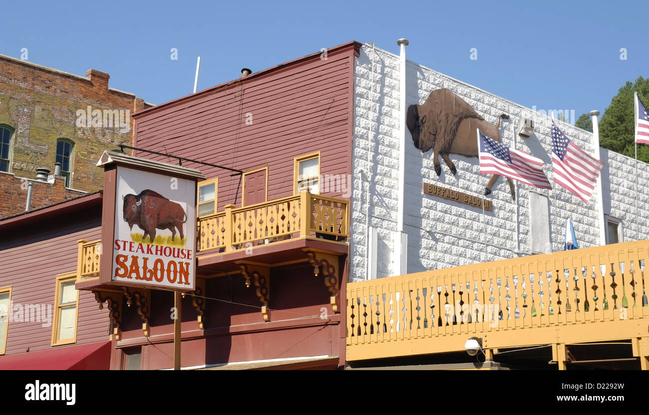Blue sky view 'Wild West' architecture Buffalo Saloon, with yellow 2nd ...