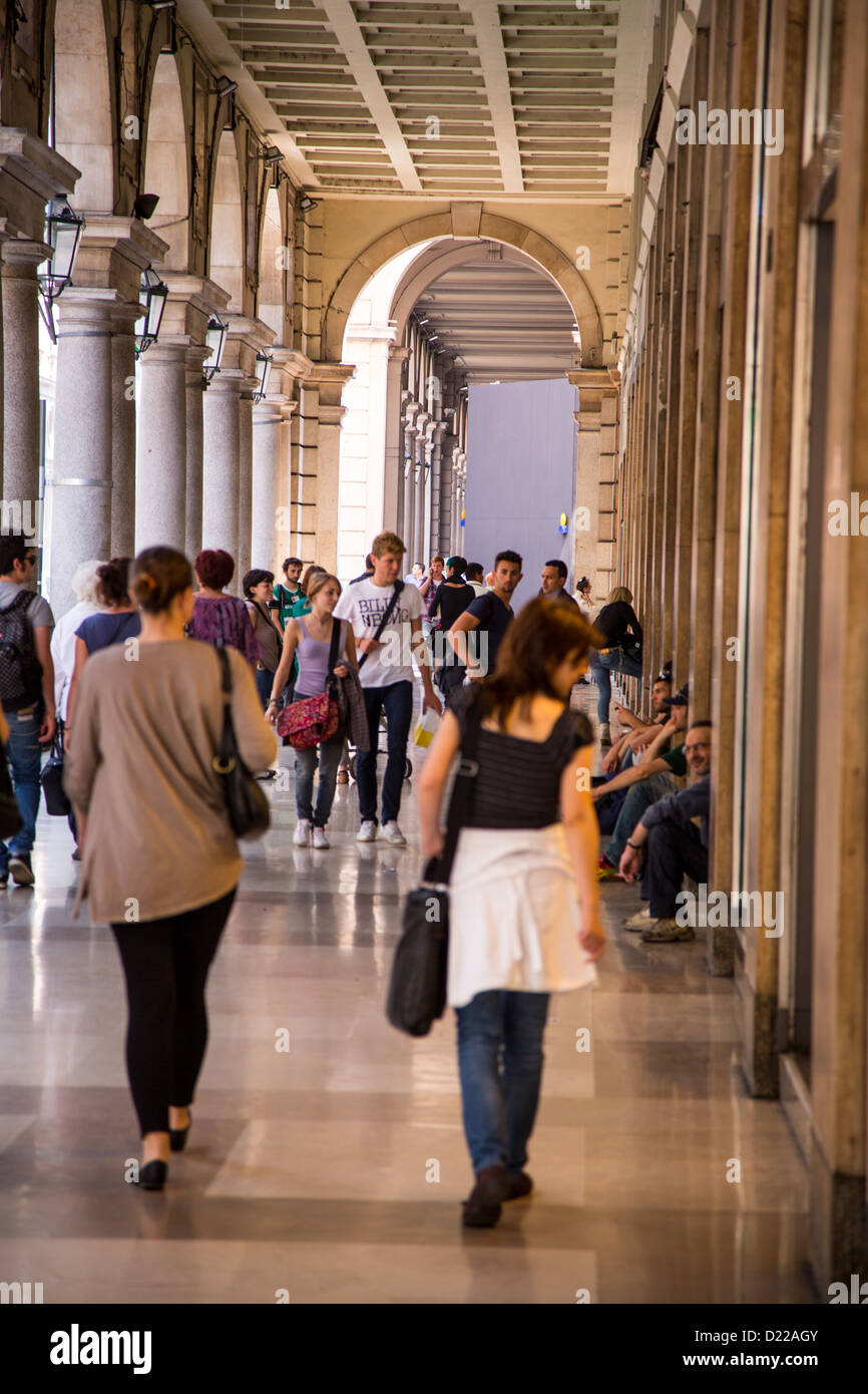 Arcaded walkways are a feature lining many streets in central Turin in ...