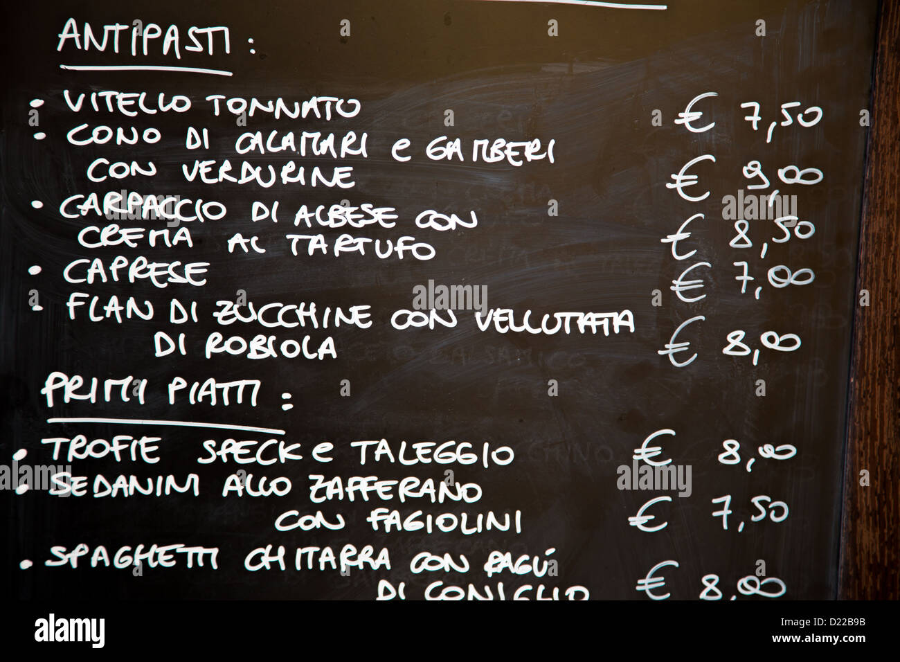 Menu board outside a restaurant in Alba Italy Stock Photo - Alamy