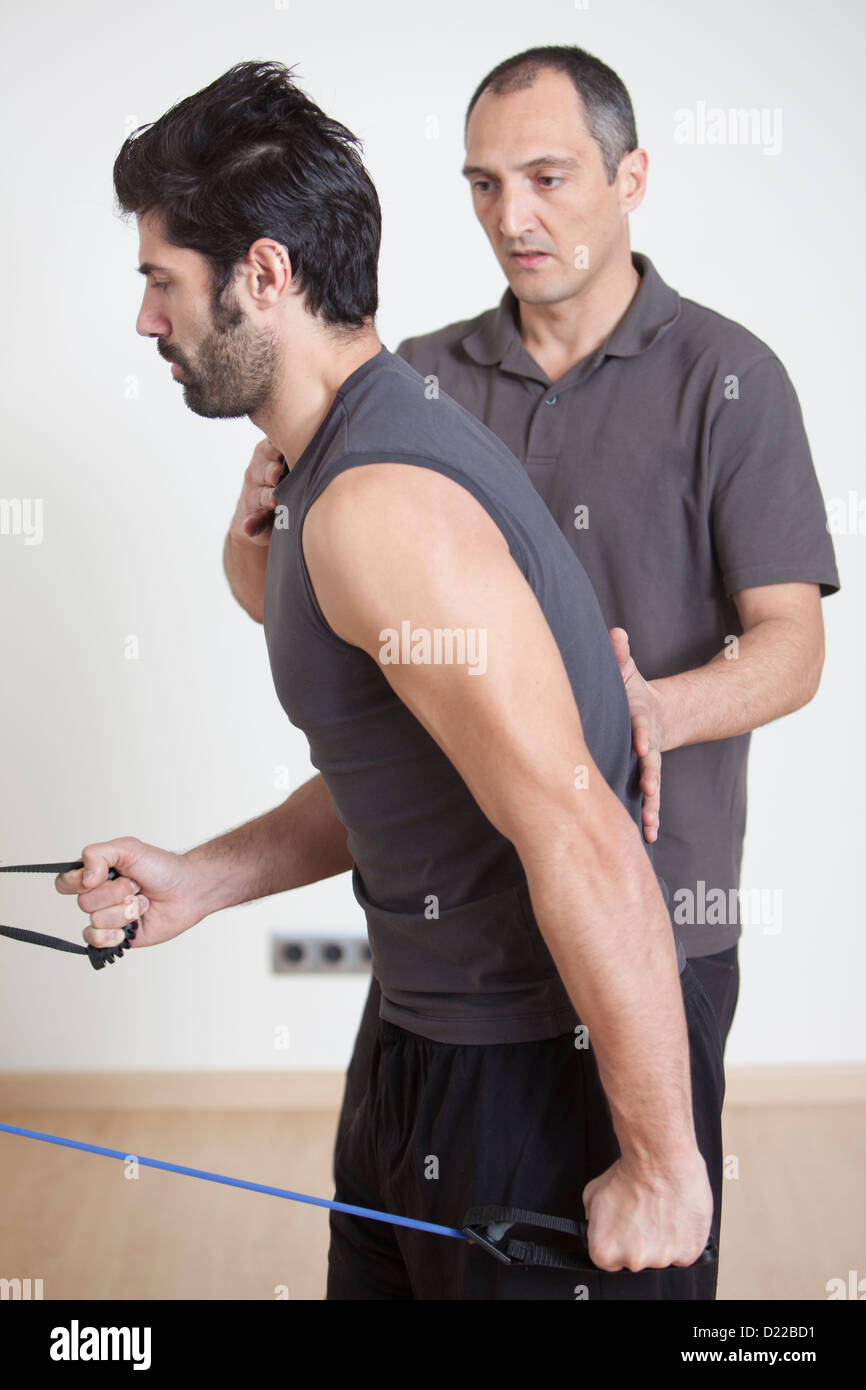 personal training of biceps strength Stock Photo - Alamy