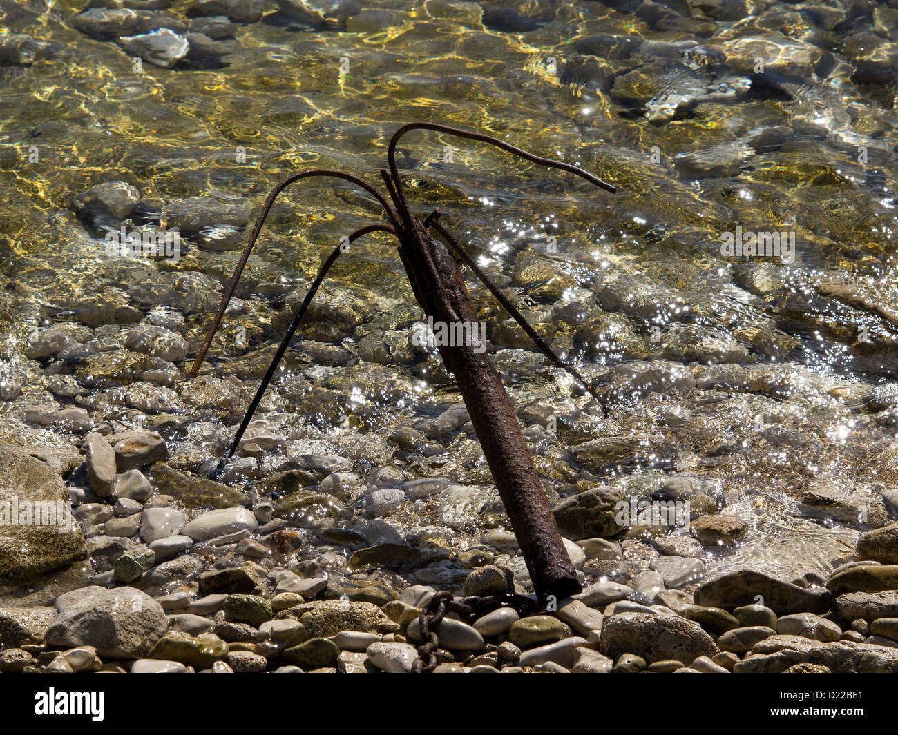 old rusty anchor in the sea Stock Photo - Alamy